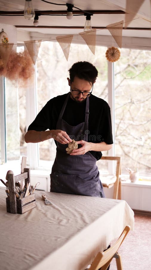 A Man at a Clay Modeling Master Class Learns How To Make Dishes Stock ...