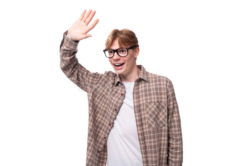 Young Charming Student Guy with Red Hair in Glasses Looks Friendly ...