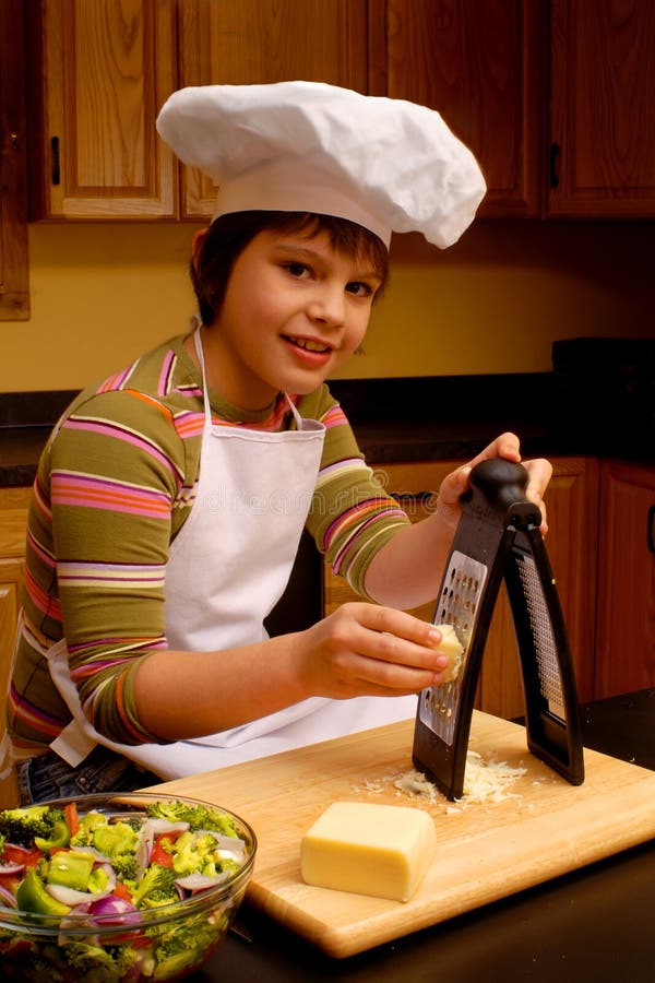 Young Chef stock image. Image of helper, cutting, pepper - 2769485