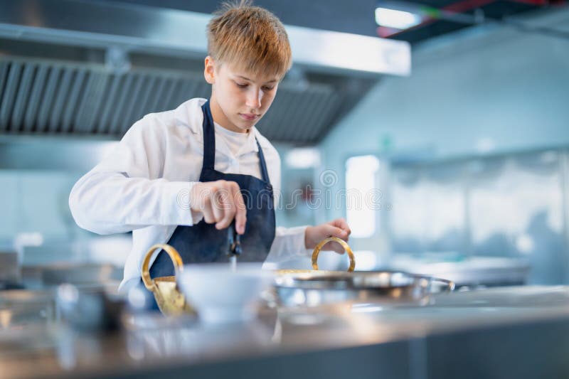 Young Chef Cooking at Restaurant Kitchen Stock Image - Image of food ...