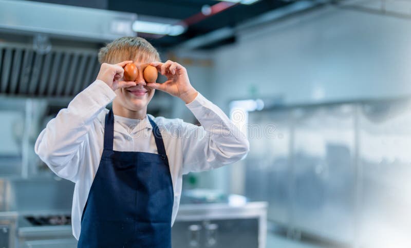 Young Chef Cooking at Restaurant Kitchen Stock Image - Image of ...