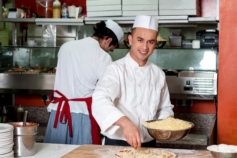 Young Chef Making Pizza at Kitchen Stock Image - Image of professional ...