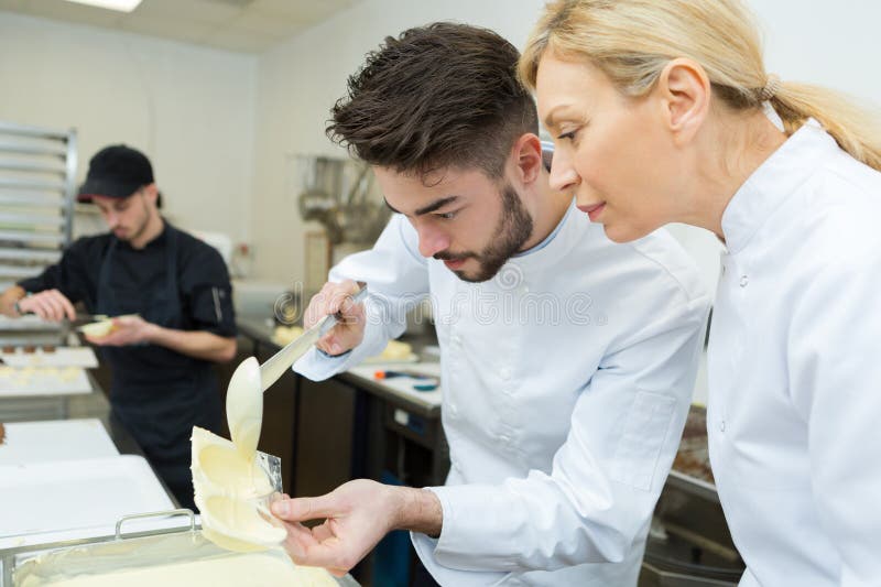 Young Chef Making White Chocolate Egg Using Mould Stock Image - Image ...