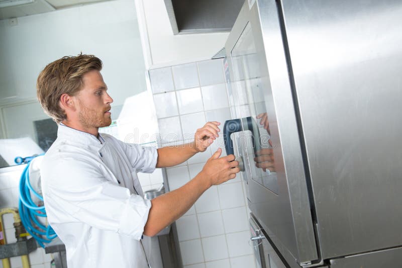 Young Chef Opening Restaurant Kitchen Fridge Stock Image - Image of ...