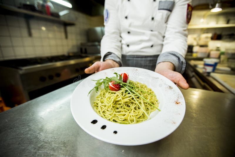 Young Chef Serve and Decorate Spaghetti Stock Photo - Image of gourmet ...