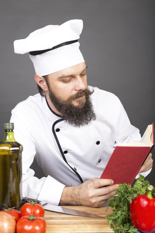 173 Male Chef Reading Recipe Book Kitchen Stock Photos - Free & Royalty ...