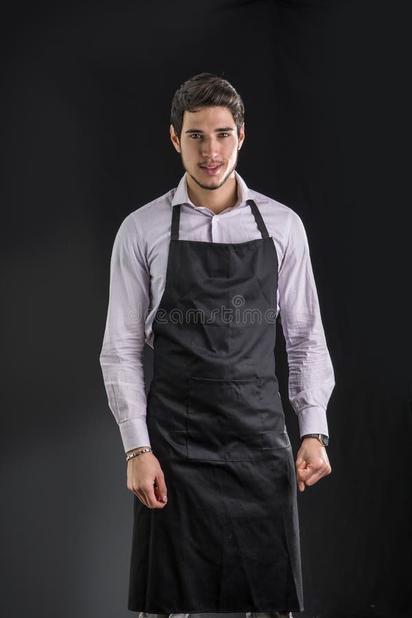 Young Chef or Waiter Wearing Black Apron Stock Image - Image of ...