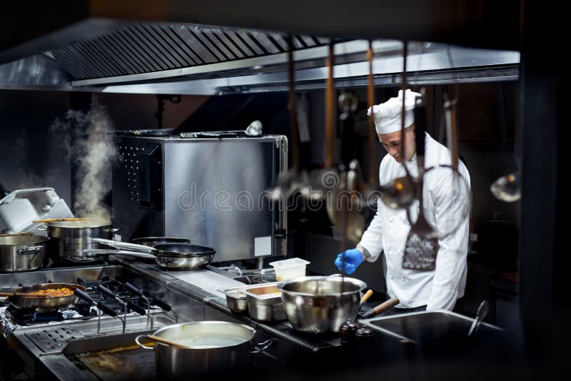 Chef Working on the Kitchen Stock Photo - Image of expert, cooker ...