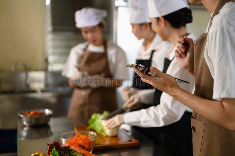 Young Chefs Documenting Cooking Steps while Learning Vegetable Cutting ...