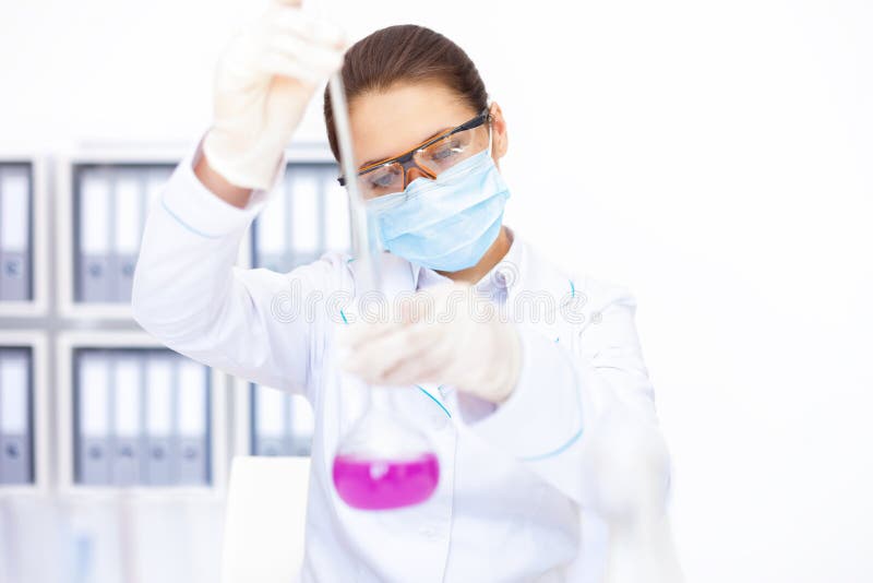 Young Chemical Female Researcher Working Stock Photo - Image of bottle ...