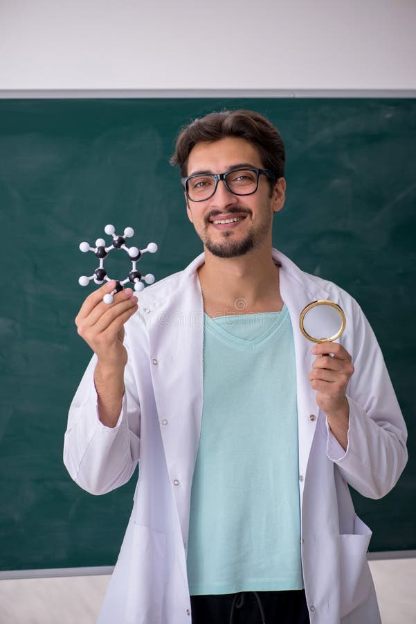 Young Male Chemist in Front of Blackboard Stock Image - Image of happy ...
