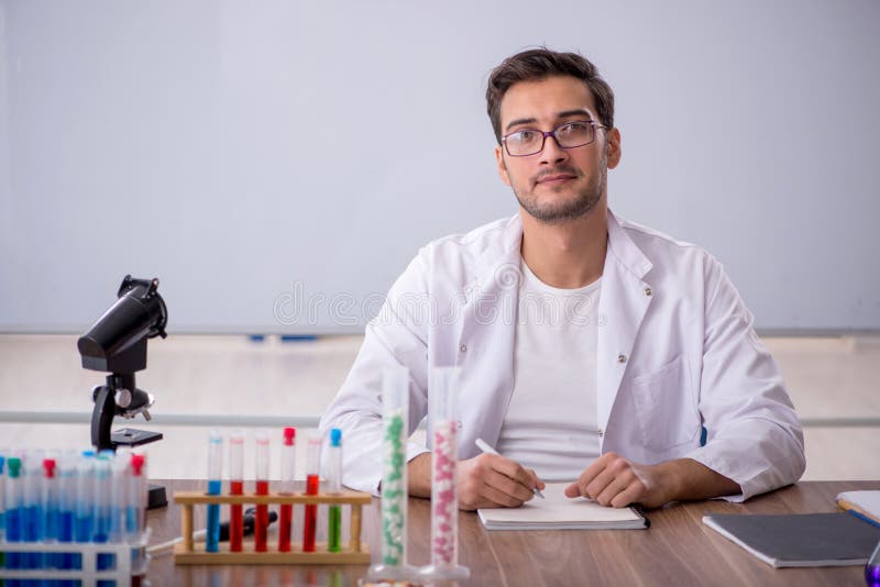 Young Male Chemist in Front of White Board Stock Image - Image of ...