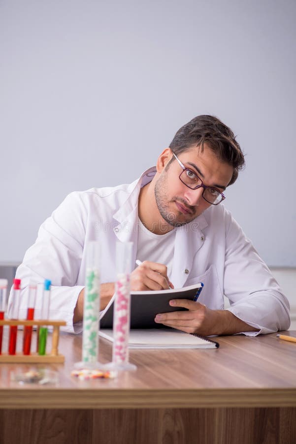 Young Male Chemist in Front of White Board Stock Image - Image of ...