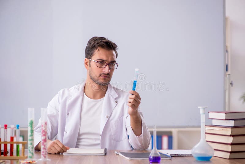 Young Male Chemist in Front of White Board Stock Photo - Image of ...