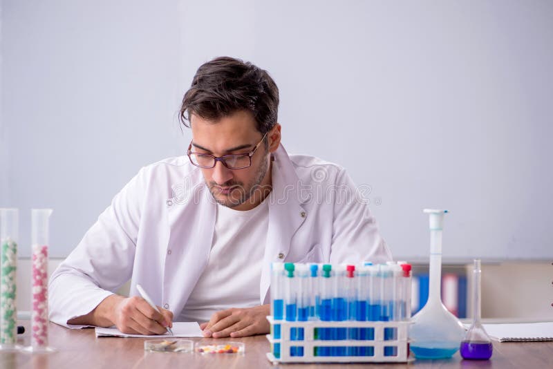 Young Male Chemist in Front of White Board Stock Photo - Image of ...