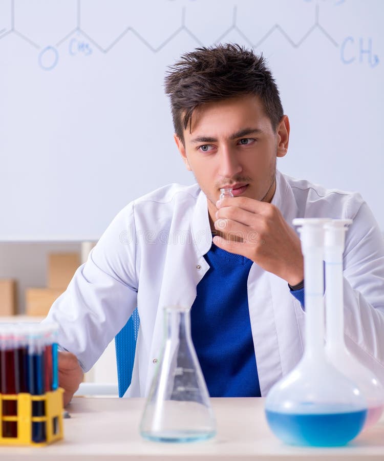 Young Chemist Sitting in the Lab Stock Image - Image of examining, health: 336924389