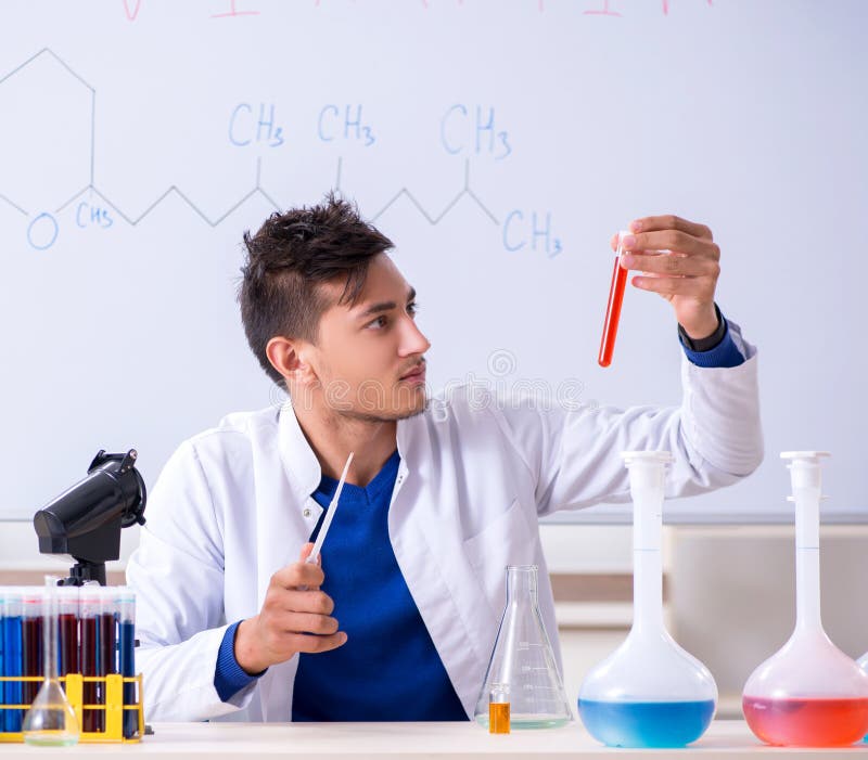 Young Chemist Sitting in the Lab Stock Image - Image of biotechnology ...