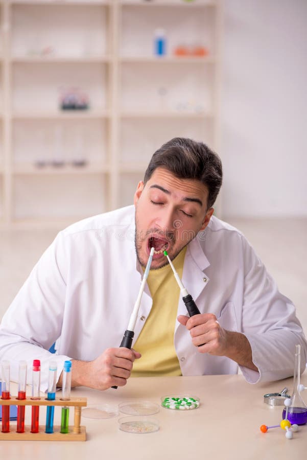 Young Male Chemist Sitting at the Lab Stock Image - Image of ...