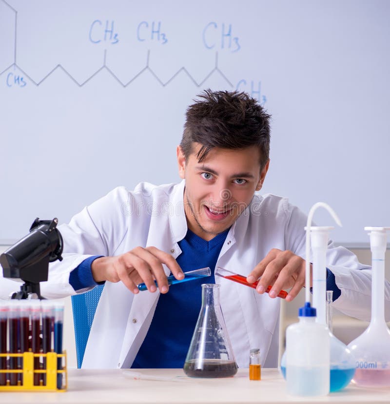 Young Male Student Studying Math at School Stock Photo - Image of math ...