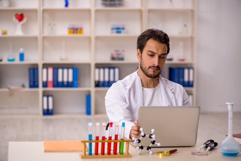 Young Male Chemist Working at the Lab Stock Image - Image of research ...