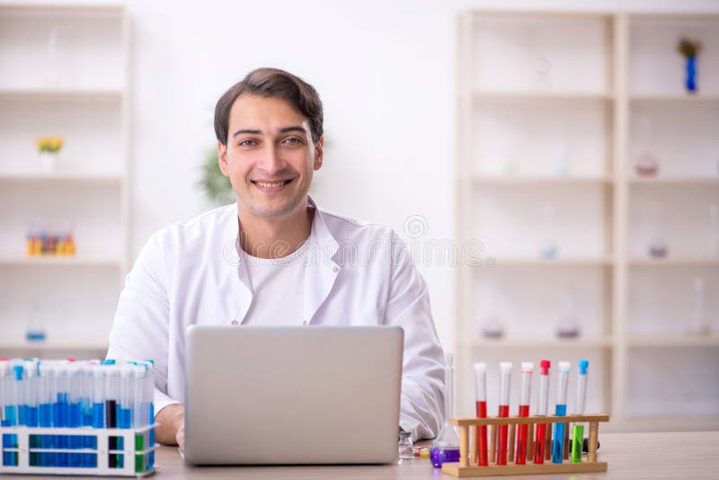 Young Male Chemist Working at the Lab Stock Photo - Image of chemist ...