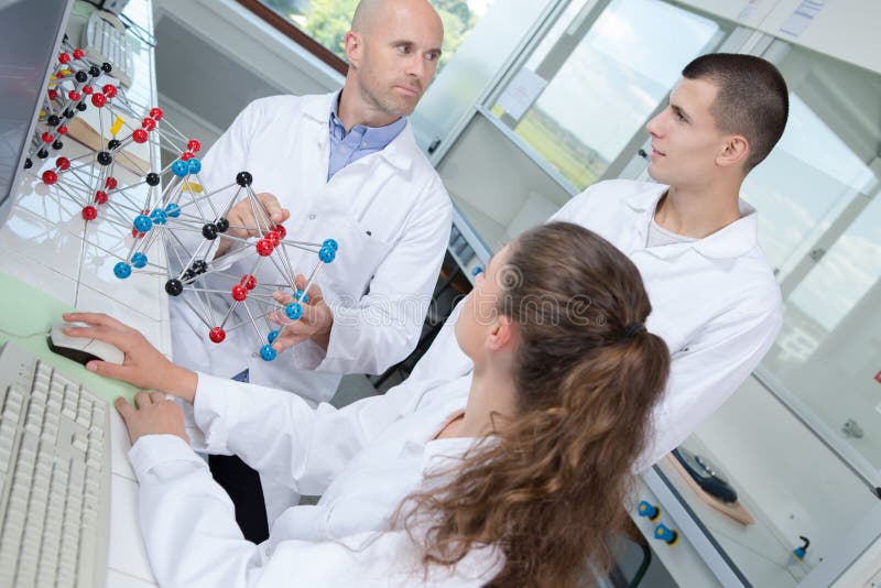 Chemists Work Lab in Morning, with Sun Shining through, with Test ...