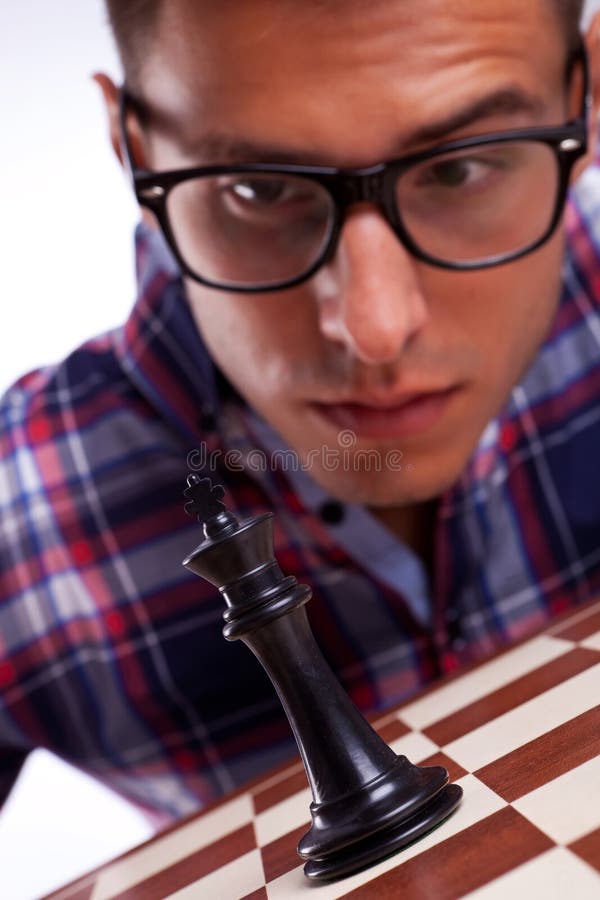 Young Chess Player Thinking about His Next Move Stock Photo - Image of ...