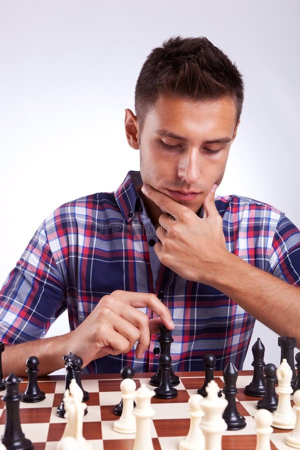 Young Chess Player Thinking about His Next Move Stock Photo - Image of ...