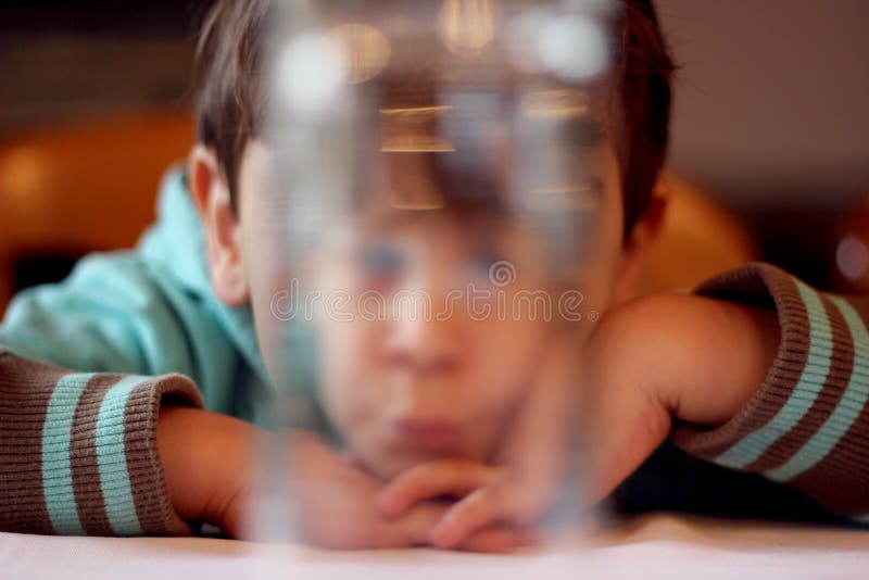 A Young Child Behind a Glass Stock Image - Image of child, children ...