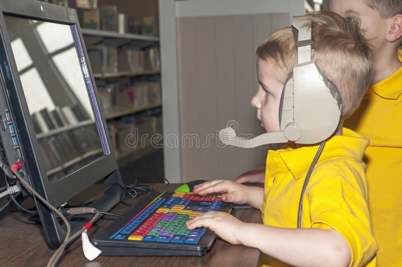 Young Child Using a Computer Stock Photo - Image of kids, computer ...