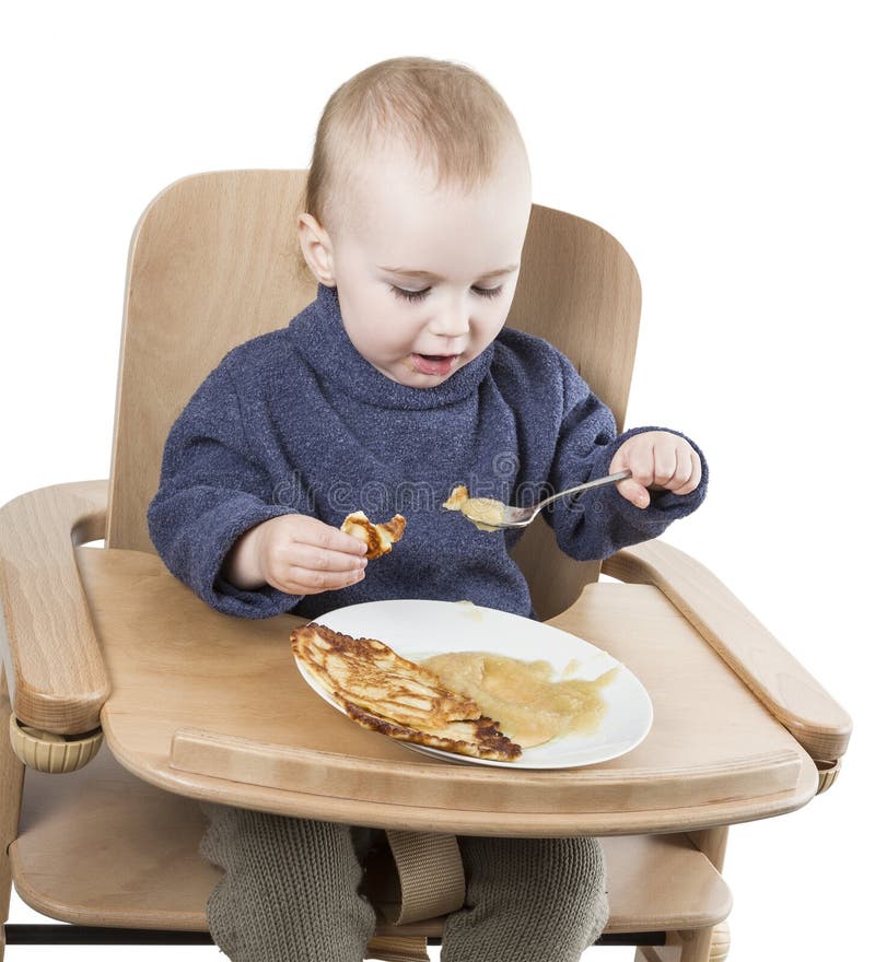 Young Child Eating in High Chair Stock Photo - Image of wood, person ...