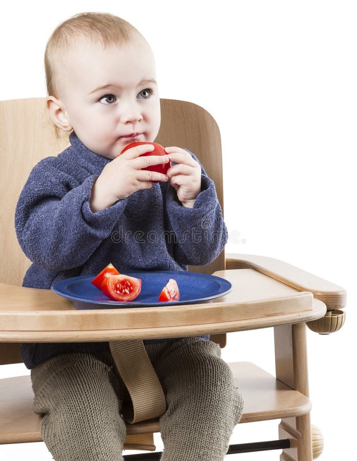 Young Child Eating in High Chair Stock Image - Image of spoon, isolated ...