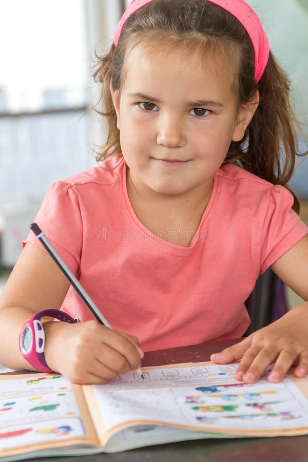 Lovely child writing stock image. Image of portrait, smiling - 9729107