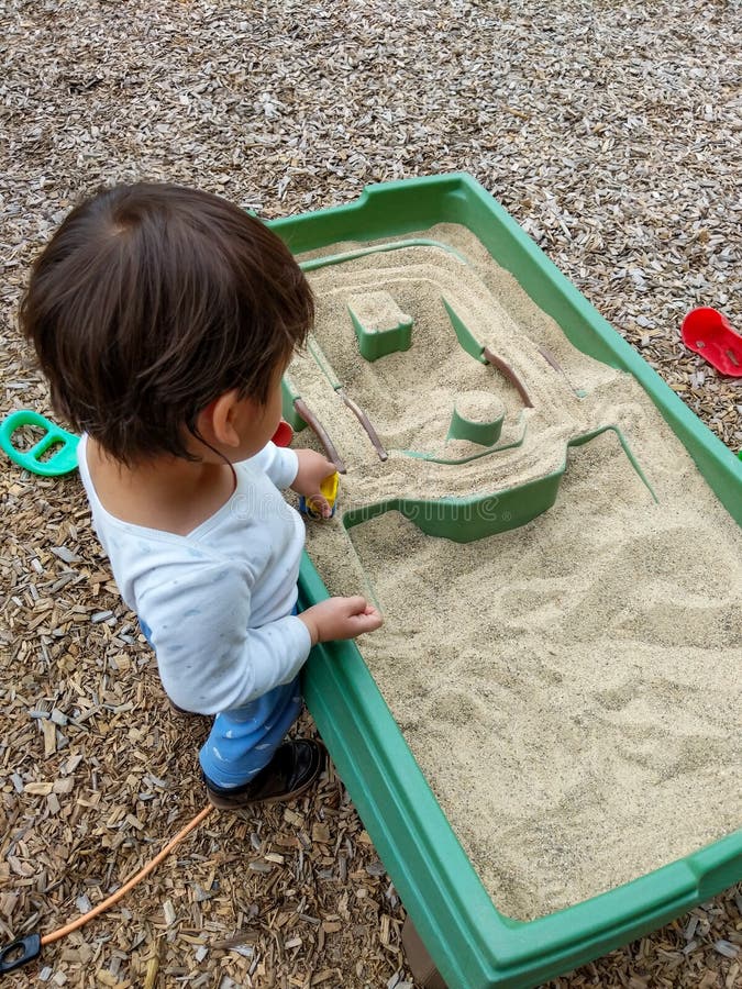 Young Child Playing in Sandbox Stock Photo - Image of kids, summertime ...
