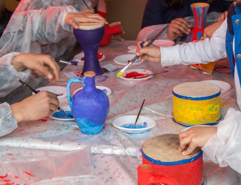Young Children Decorating Handmade Clay Pottery Stock Photo - Image of ...