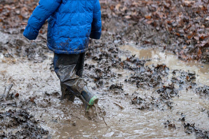 Young Children Playing in a Mud Puddle Stock Image - Image of girl ...