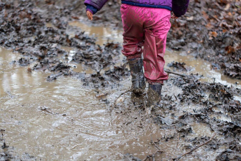 Young Children Playing in a Mud Puddle Stock Image - Image of play ...