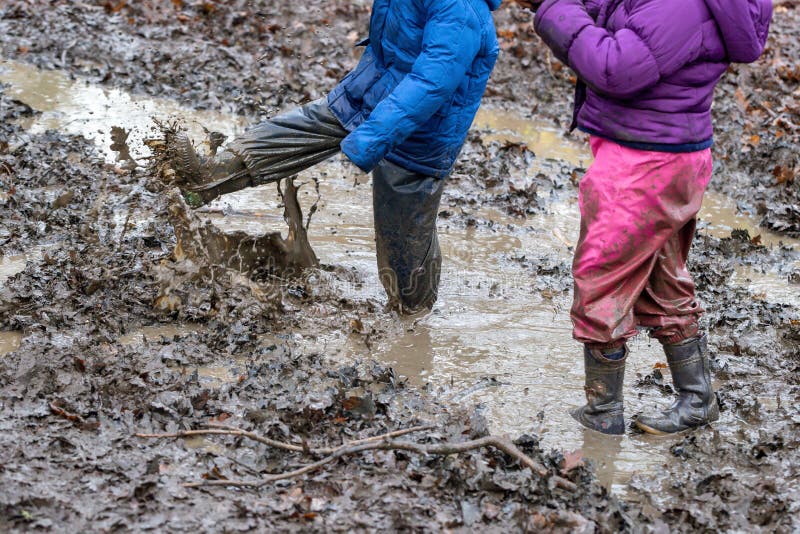 Young Children Playing in a Mud Puddle Stock Image - Image of fall ...