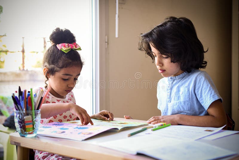 Young Children Working at Home Stock Image - Image of help, paper ...
