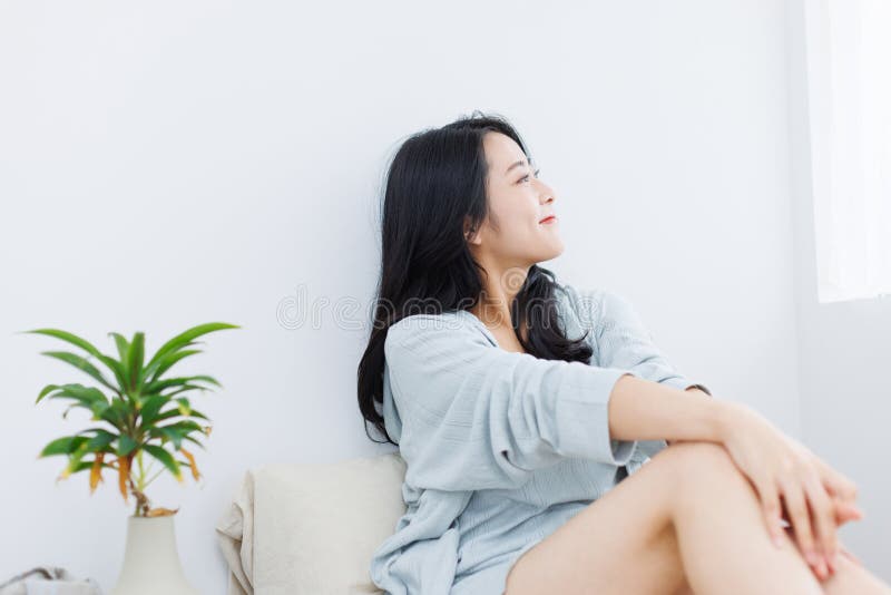 Young chilling at home stock image. Image of woman, relaxing - 299913255