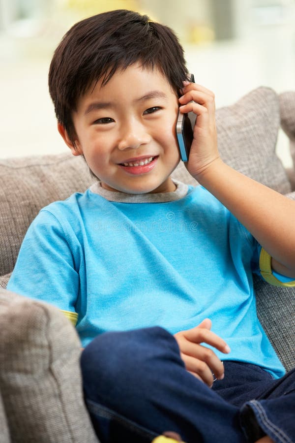 Young Chinese Boy Using Mobile Phone Stock Image - Image of smartphone ...