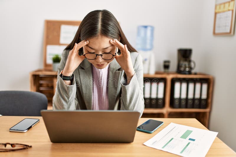 Young Chinese Businesswoman Stressed Working at the Office Stock Image ...