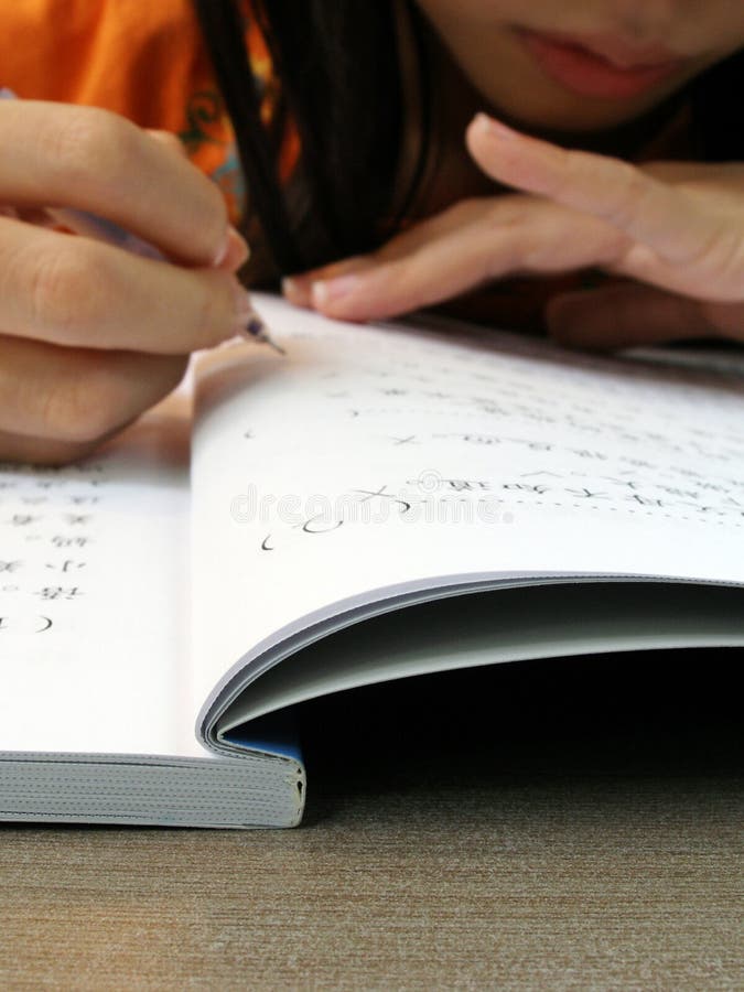 Young Chinese Girl Studying Stock Photo - Image of classroom, hands ...