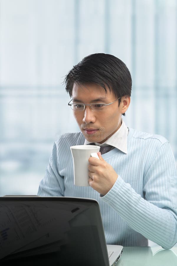 Young Chinese Male Working in Office Stock Photo - Image of male, urban ...