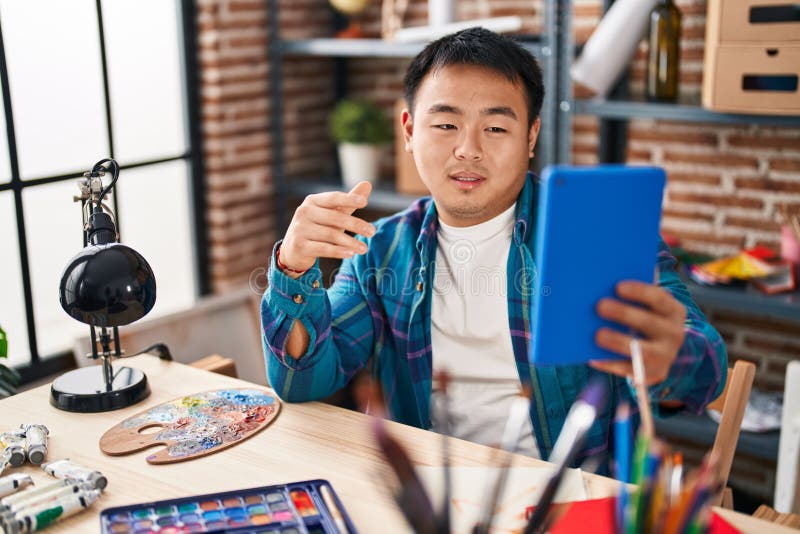 Young Chinese Man Artist Having Video Call at Art Studio Stock Photo ...