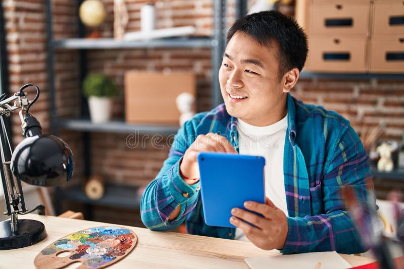 Young Chinese Man Artist Using Touchpad at Art Studio Stock Photo ...