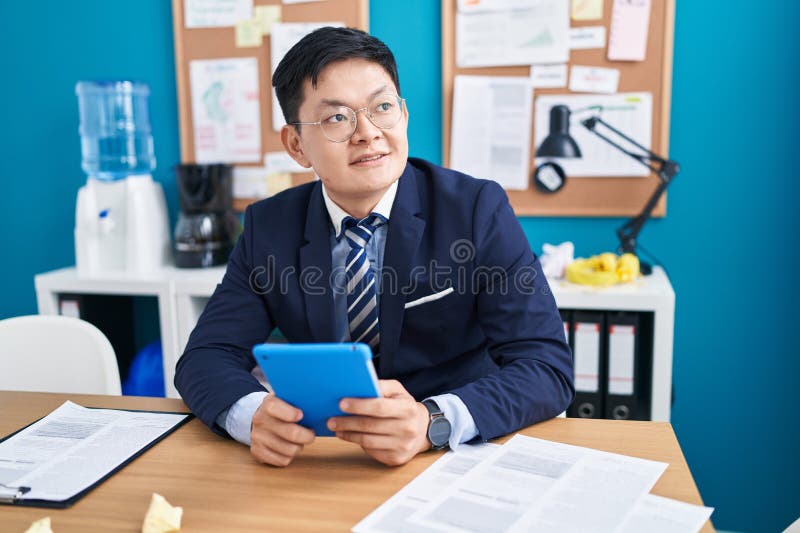 Young Chinese Man Business Worker Using Touchpad at Office Stock Photo ...