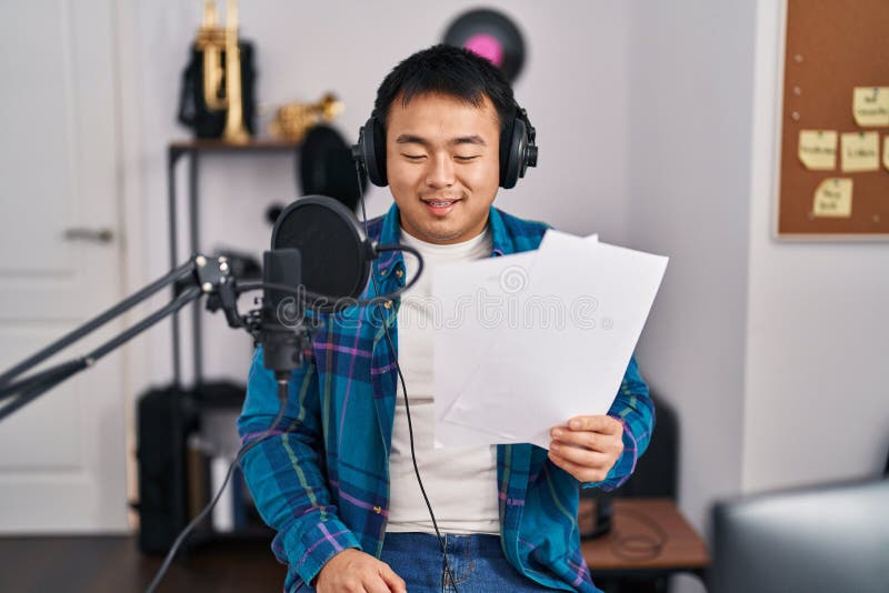Young Chinese Man Singer Singing Song at Music Studio Stock Image ...