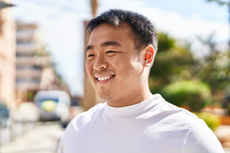 Young Chinese Man Smiling Confident Standing at Street Stock Image ...
