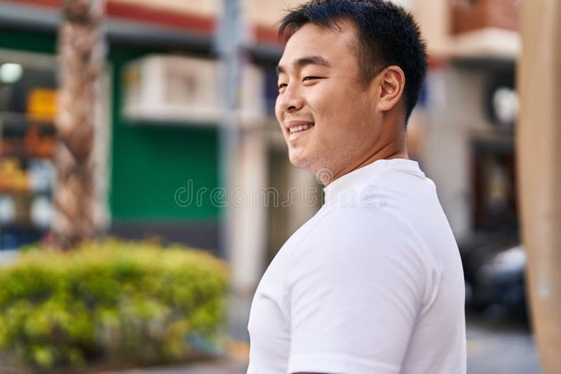 Young Chinese Man Smiling Confident Standing at Street Stock Photo ...